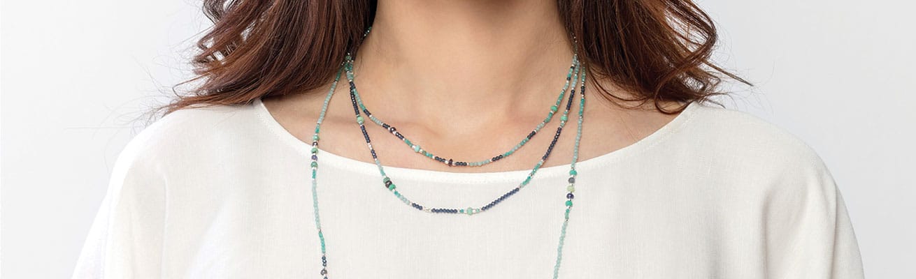 Cómo combinar collares largos > estilo layering